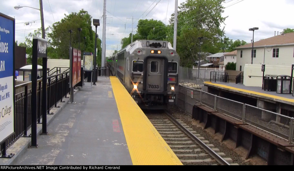 Cab Car 7033 Passing Through